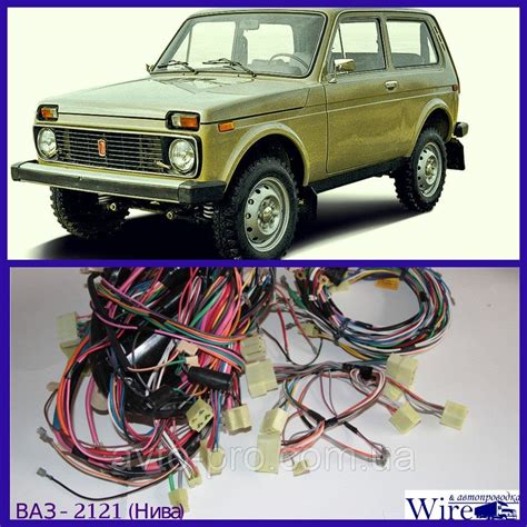 an old car with many wires attached to the front and rear ends, next to ...