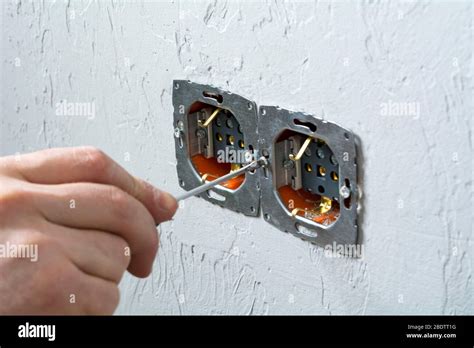 Socket Plug Installation Disassembled Electrical Outlet In Detonation Wall With Bare Wires And