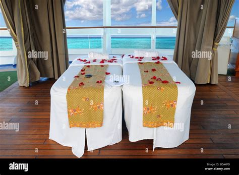 Massage Beds On A Cruise Ship With Beautiful Tropical Beach In