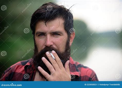 Smoking Bearded Man Outdoor Bad Habit Cigarette Addiction Stock