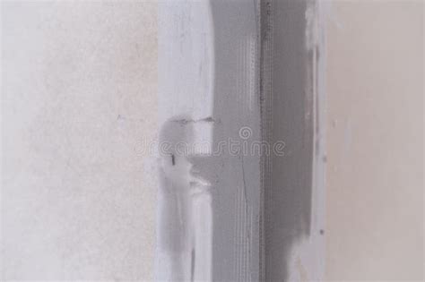 Applying Decorative Putty White Abstract Texture Of Surface Covered