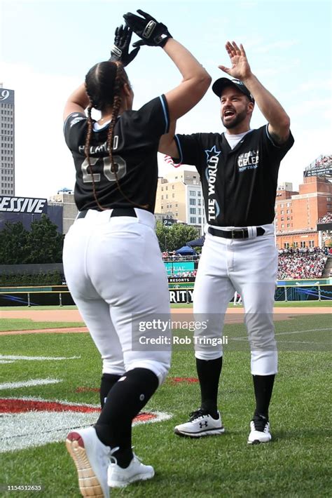 Dascha Polanco High Fives Teammate Johnny Bananas During The Legends