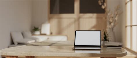 Premium Photo A Whitescreen Laptop Mockup On A Tabletop In A Modern