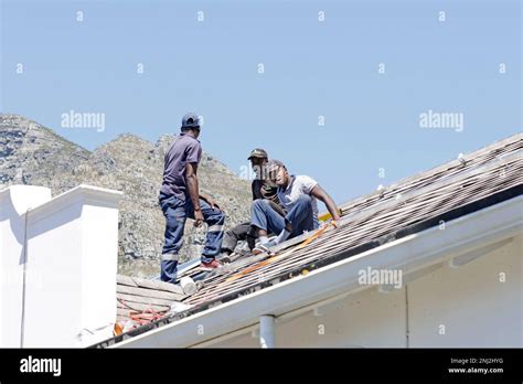 Team Installing Hybrid Grid Tied Electrical Installation Of Solar