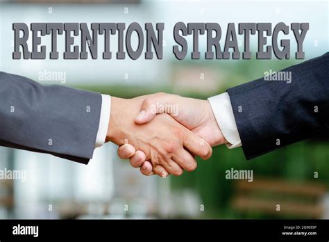 Writing Displaying Text Retention Strategy Word Written On Activities To Reduce Employee
