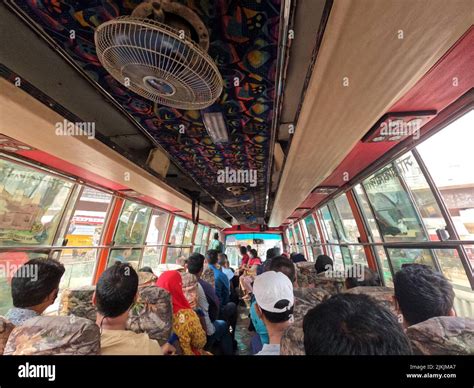 A Beautiful Shot Of People Sitting Inside Public Bus Transportation In