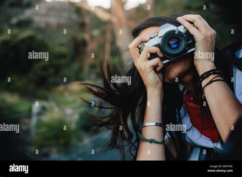 Woman Outdoors Taking Pictures With Her Camera Female Traveler Making