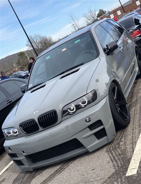 Silver Bmw E46 Parked In A Parking Lot