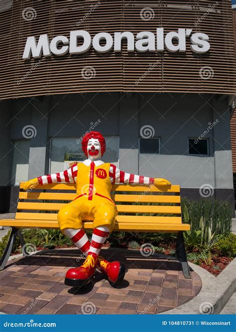 A Ronald Mcdonald Statue Mascot In Front Of The Mcdonald`s Fast Food