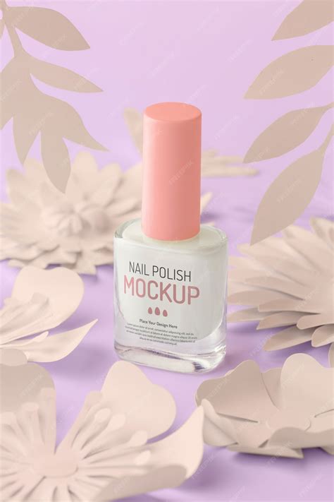 Premium Psd Nail Polish Bottle Design Mock Up With Paper Flowers