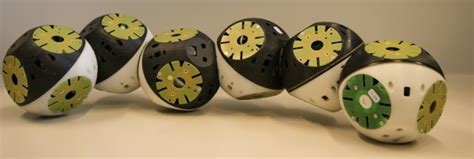 M Blocks And Roombots Self Assembling Robots With Many Uses