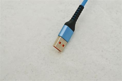 Premium Photo Usb Cable Connection Detail Highlighted On A Clear Surface Perfect For Modern