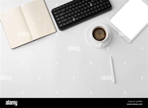 Minimalistic White Workplace With Keyboard And Notebook Stock Photo Alamy