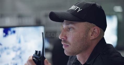 Man Walkie Talkie Or Speaking With Cctv Monitor For Protection Security Service Or Building