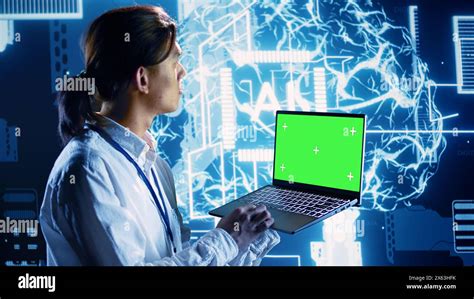 Engineer Using Mockup Laptop To Implement Artificial Intelligence