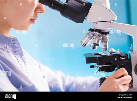 MODEL RELEASED Female Lab Technician Using Microscope Stock Photo Alamy
