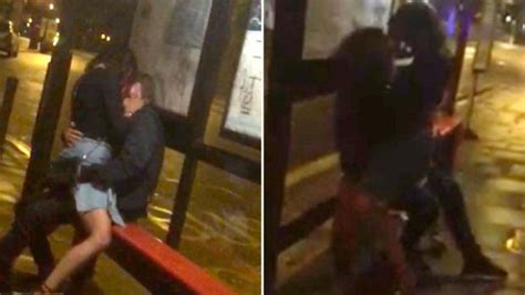 Brazen Couple Shock Onlookers As They Romp In A Bus Stop For Half An