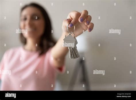 Happy Woman Show Keys Moving To New Apartment Stock Photo Alamy
