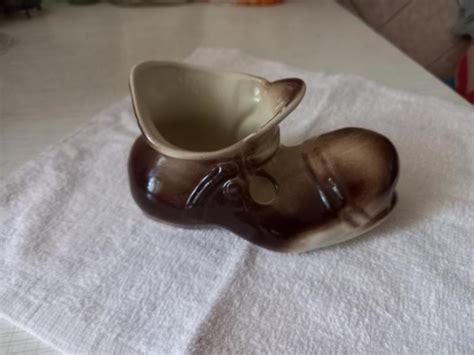 Форфоровая статуэтка пепельница бошмачок — цена 250 грн в каталоге Статуэтки Купить товары для