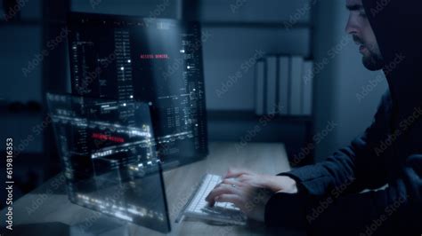 Futuristic Cyber Hacker Operating Under The Guise Of Anonymous Employs