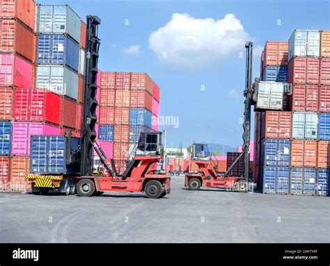 Container Stacker Load The Container Into The Truck Transportation Concept Stock Photo Alamy
