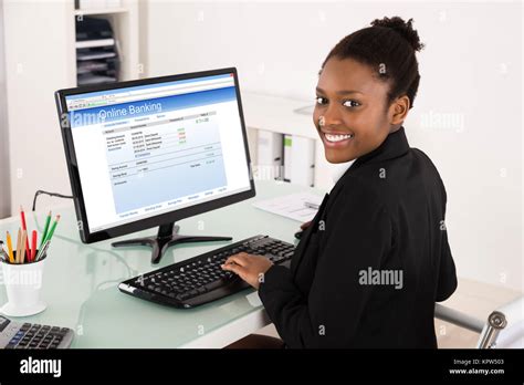 Businesswoman Doing Online Banking On Computer Stock Photo Alamy