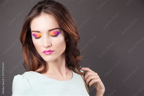 Beautiful Young Woman With Vivid Makeup Stock Foto Adobe Stock