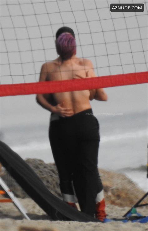 Megan Rapinoe And Sue Bird During A Romantic Photoshoot On The Beach In