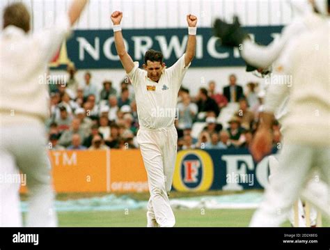 Andrew Caddick Centre And The Rest Of The England Team Celebrate The