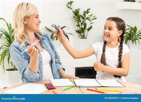 Mother And Daughter Spending Time Together At Home Drawing Stock Image Image Of Adult