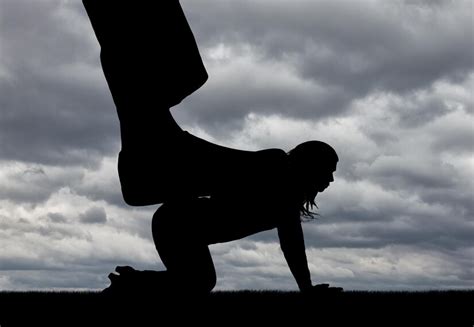 Premium Photo Silhouette Of A Large Mans Leg Presses On A Woman