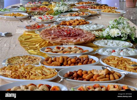 Table Set With A Large Buffet Catering With Various Kinds Of Food