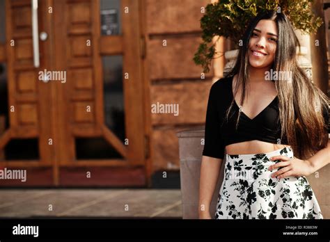 Pretty Latino Model Girl From Ecuador Wear On Black Tops And Skirt