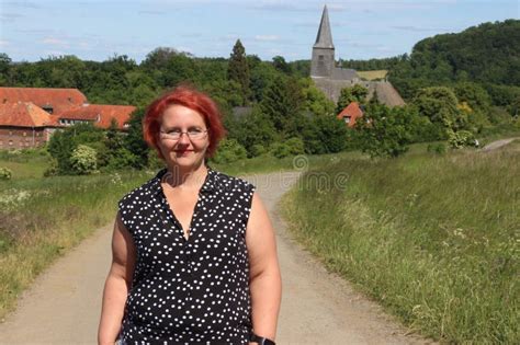 Outdoor Portrait Of A Beautiful Redhead Woman While Walking Stock Image Image Of Beauty