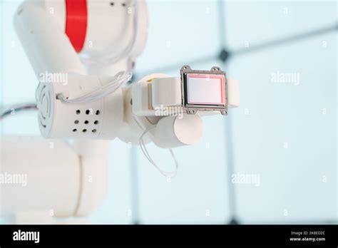 Robot Arm With Ccd And Cmos Matrix Image Sensor In The Manipulator Concept On The Topic Of
