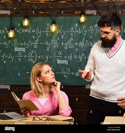 College And Education Concept Girl Student Listening Bearded Teacher