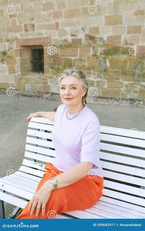 Outdoor Portrait Of Happy And Healthy Mature 50 55 Year Old Woman
