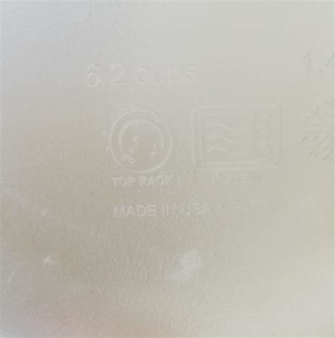 Heres The Meaning Of Those Weird Symbols On Your Tupperware Teen Vogue