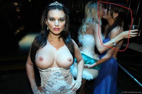 What Is The Name Of This Pornstar In The Blue Dress In The Background