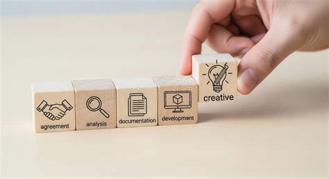 Hand Placing Wooden Blocks Labeled Agreement Analysis Documentation