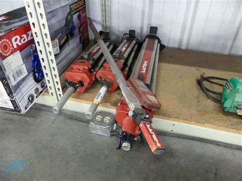 3 Hilti Tripods With Height Stick Roller Auctions