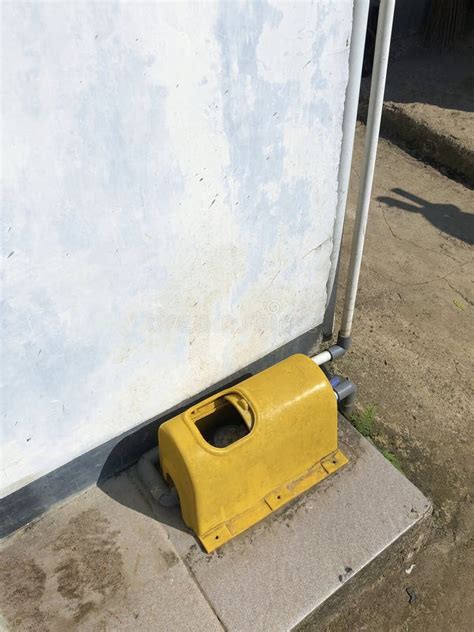 Water Meter Display On Ceramics On The Side Of The House Stock Photo Image Of Yellow Display