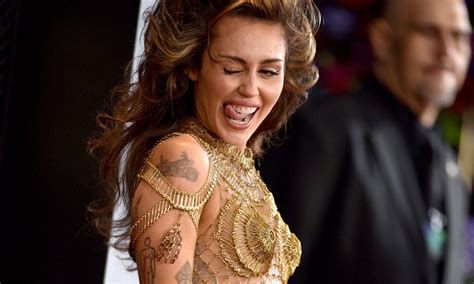 Mileys Safety Pin Dress Revolutionizes Red Carpet Mileys Safety Pin