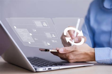 Premium Photo Man Holds A Smartphone With Update Software Computer Program Upgrade Business