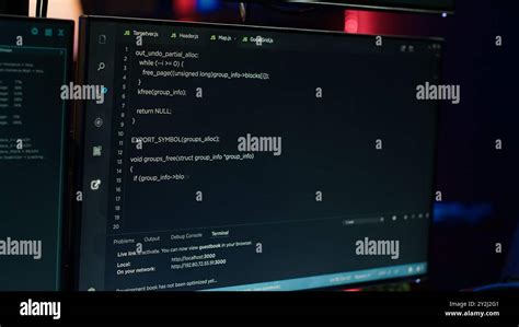 Extreme Close Up Of Software Interface On Pc Screens Showing Lines Of Code Running In Empty