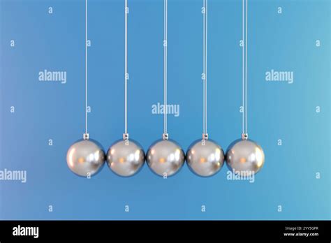 Newtons Cradle Pendulum On Blue Background Illustration Of The Principles Of Conservation Of