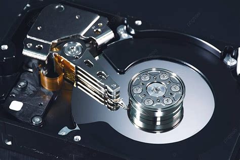 Internal Hard Disk Drive With Metal Platters And Actuator Arms Photo Background And Picture For