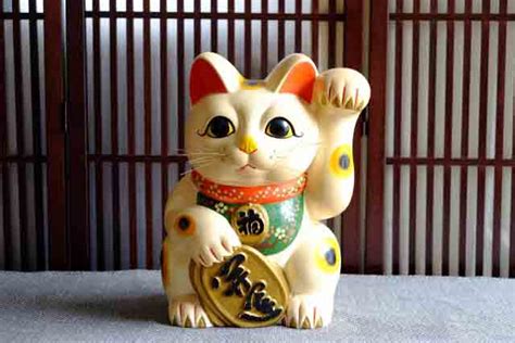 招き猫 NPO法人 国際留学生協会向学新聞
