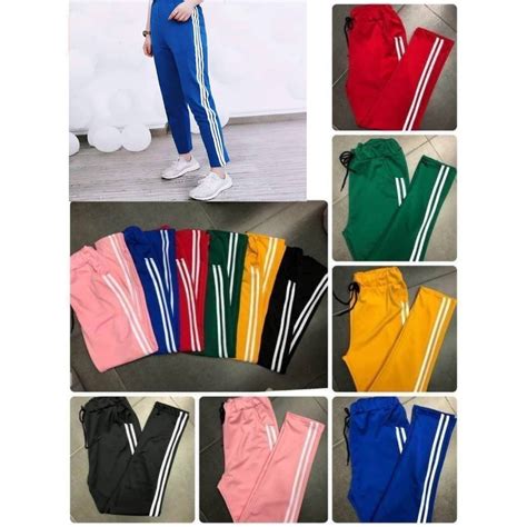 กางเกงวอร์มแถบหลากหลายแถบ ขาปล่อย ราคาถูกสุดๆ มีหลายสี Shopee Thailand