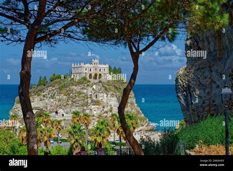 View Through Pine Trees To The Medieval Church Santuario Di Santa Maria